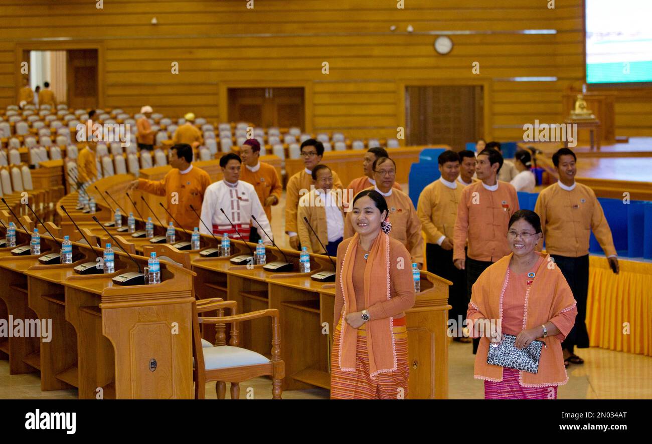 Lawmakers of National League for Democracy party (NLD) walk in Manama's ...