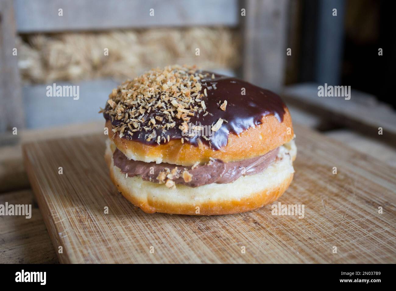 A berlina is a spherical preparation of sweet dough fried in fat or oil ...