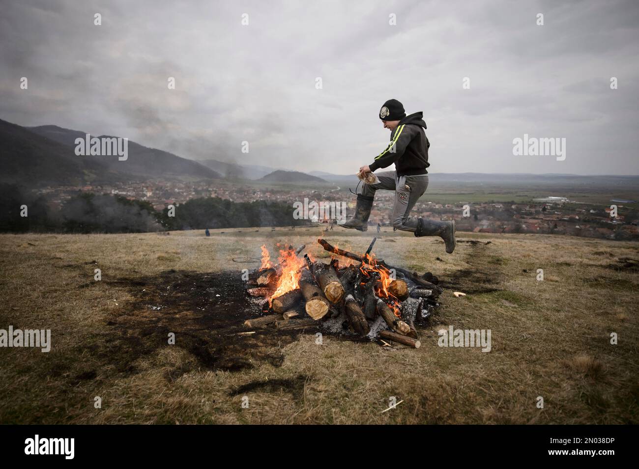In this picture taken on Sunday, March. 13, 2016, a young man jumps ...