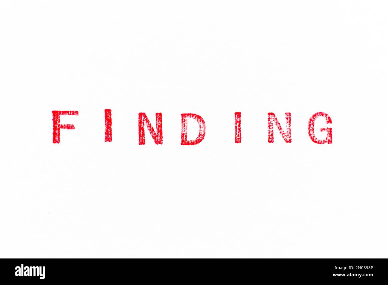 Red color rubber stamp in word finding on white paper background Stock ...