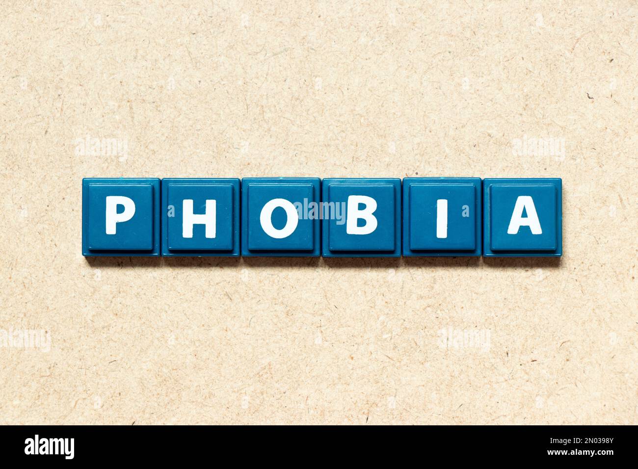 Tile alphabet letter in word phobia on wood background Stock Photo - Alamy