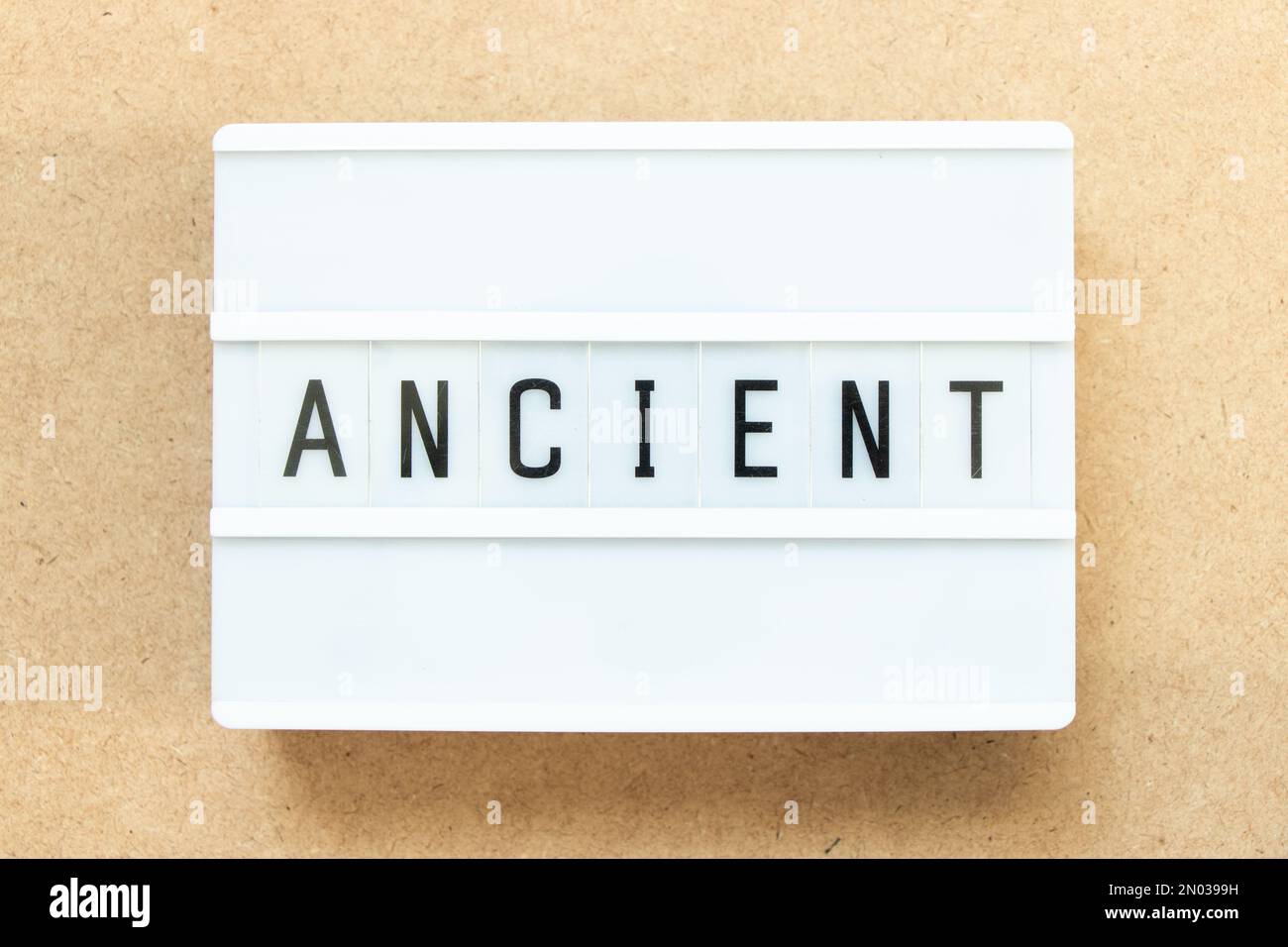 Lightbox with word ancient on wood background Stock Photo - Alamy