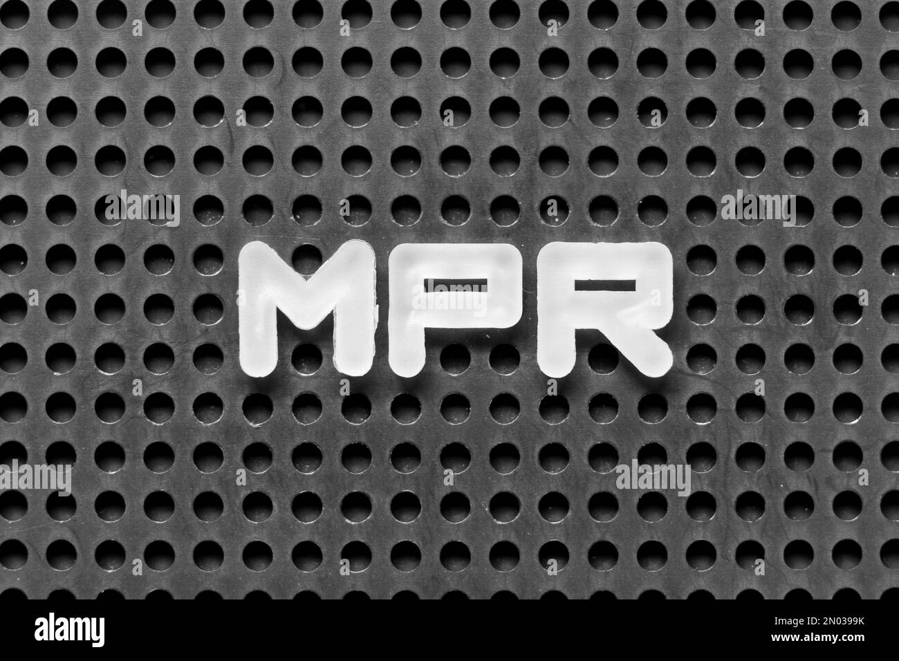 White alphabet letter in word MPR (Abbreviation of Market price ...