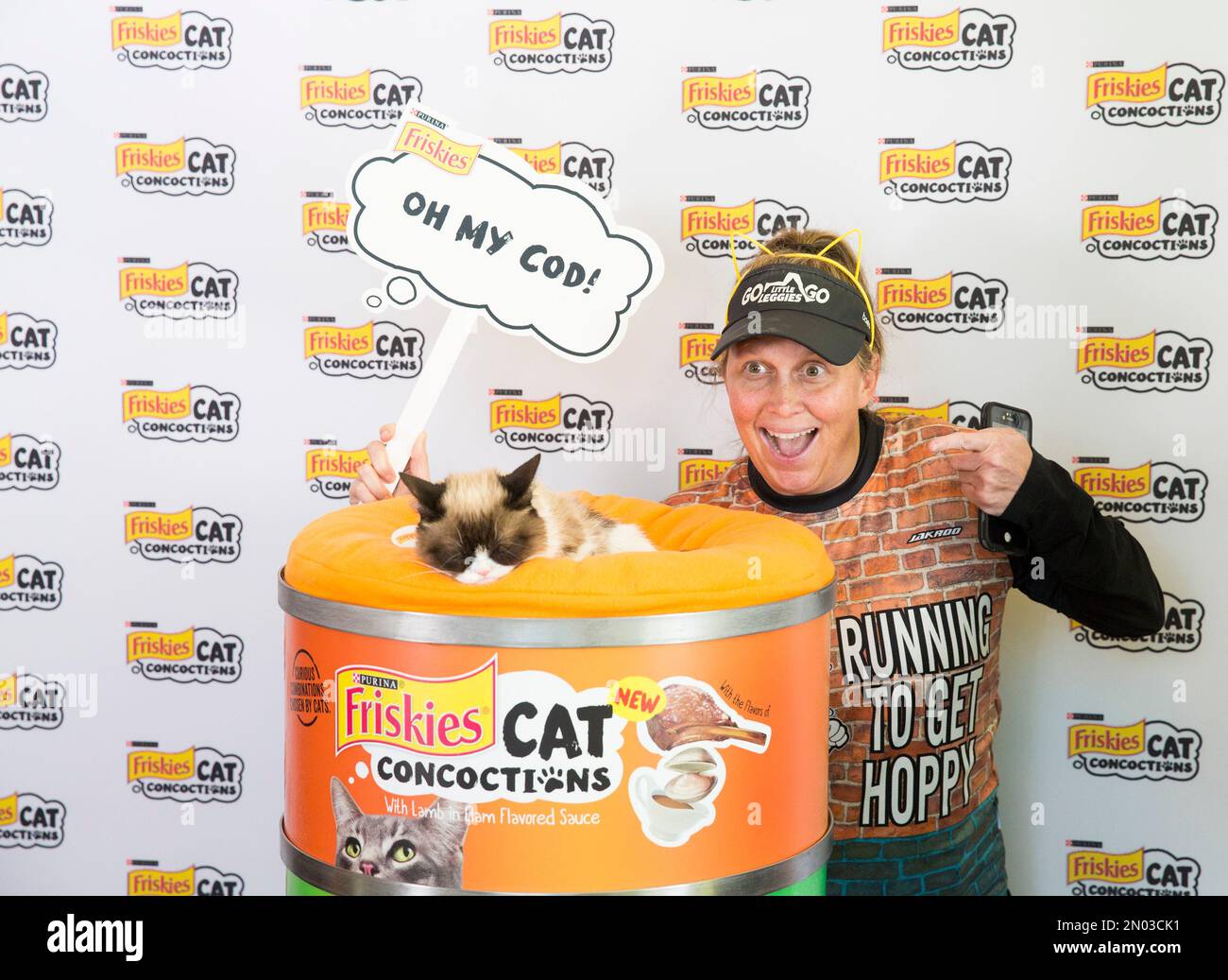IMAGE DISTRIBUTED FOR FRISKIES - Fans use various props as they frown with Friskies' "official ...