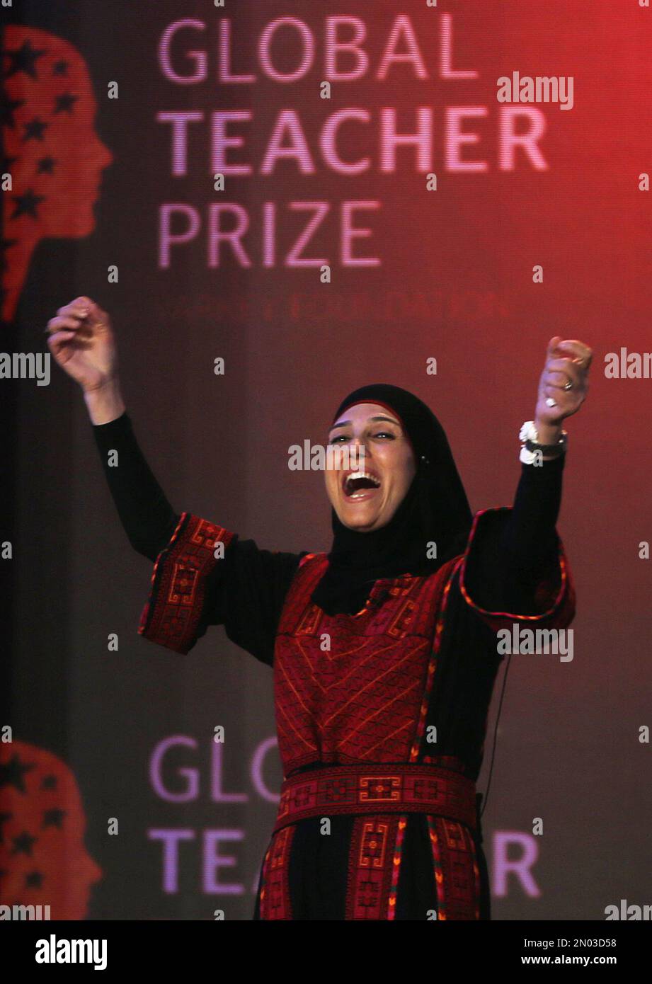 Palestinian primary school teacher Hanan al-Hroub reacts after she won ...