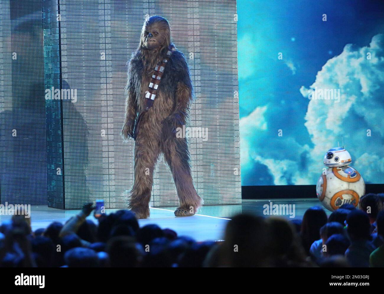 Chewbacca, left, and BB-8 accept the award for favorite movie for "Star ...