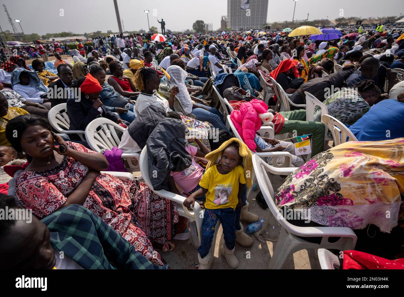 People listen to a Holy Mass led by Pope Francis at the John Garang ...