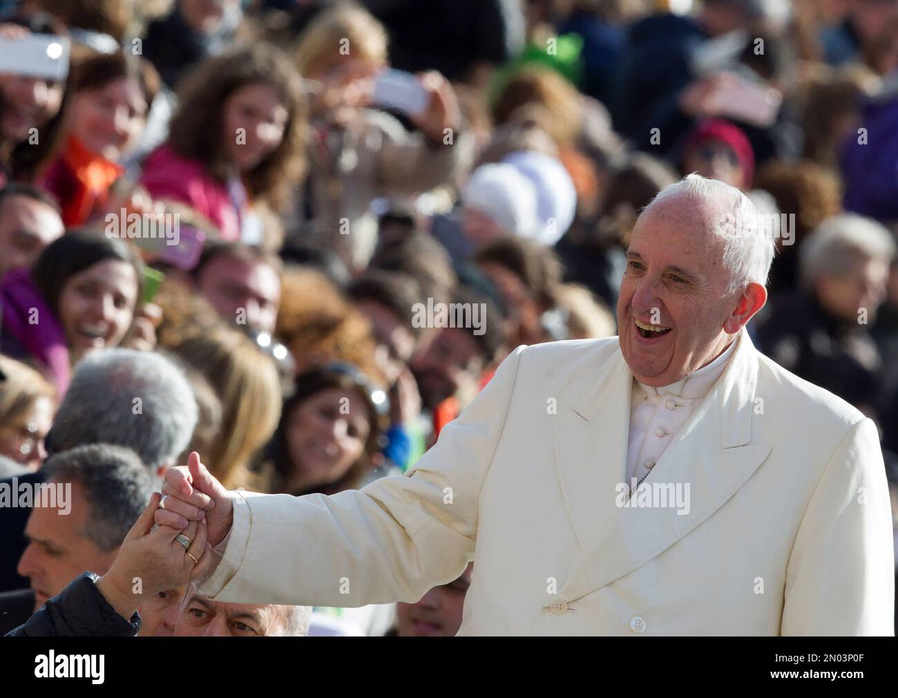 Pope Francis is cheered by faithful as he arrives in St. Peter's Square ...