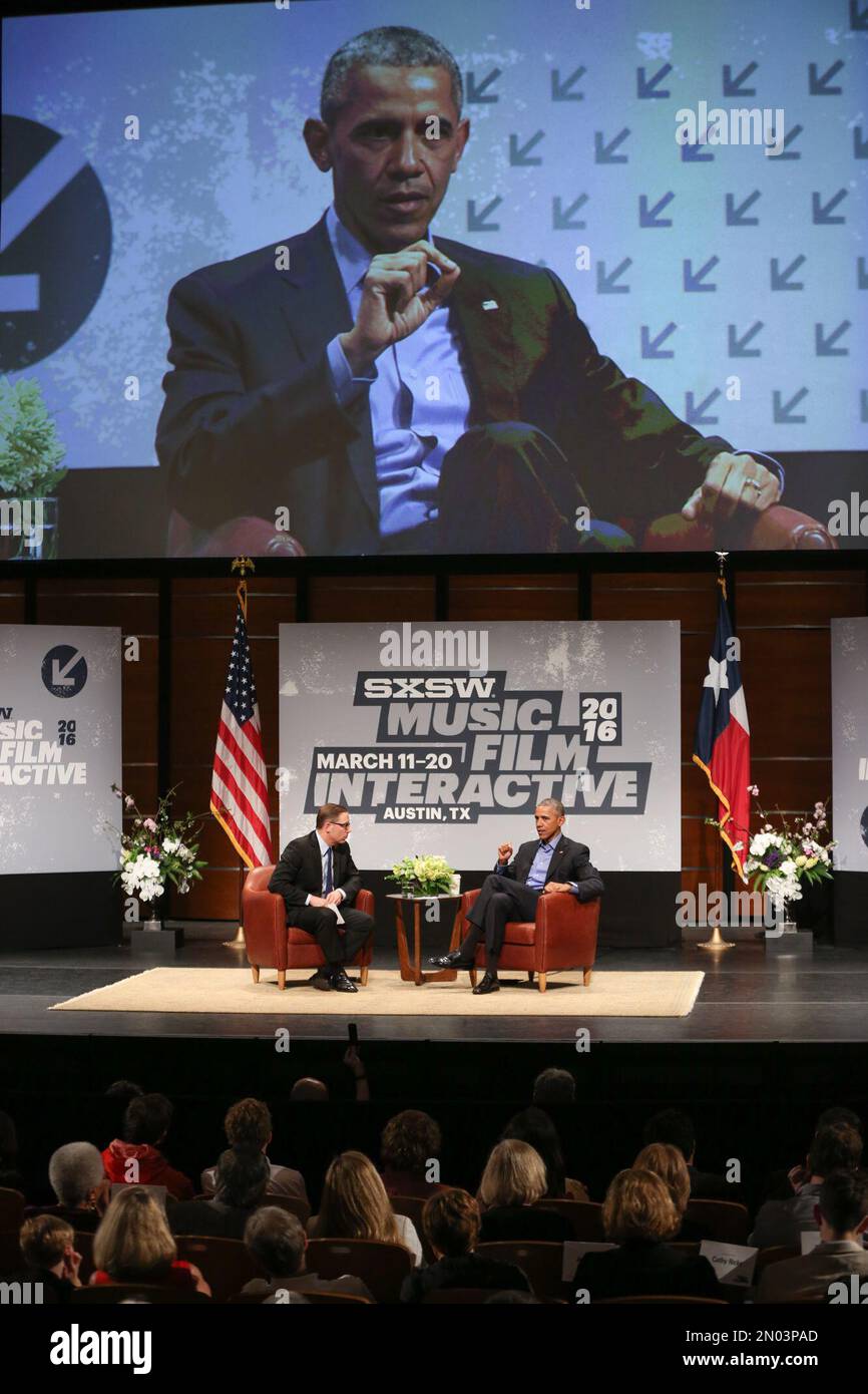 Evan Smith, left, and President Barack Obama speak during the opening ...