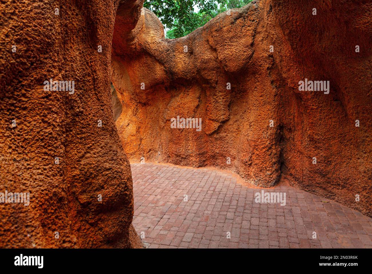 Grotto cavern . Walking between rock formation Stock Photo - Alamy