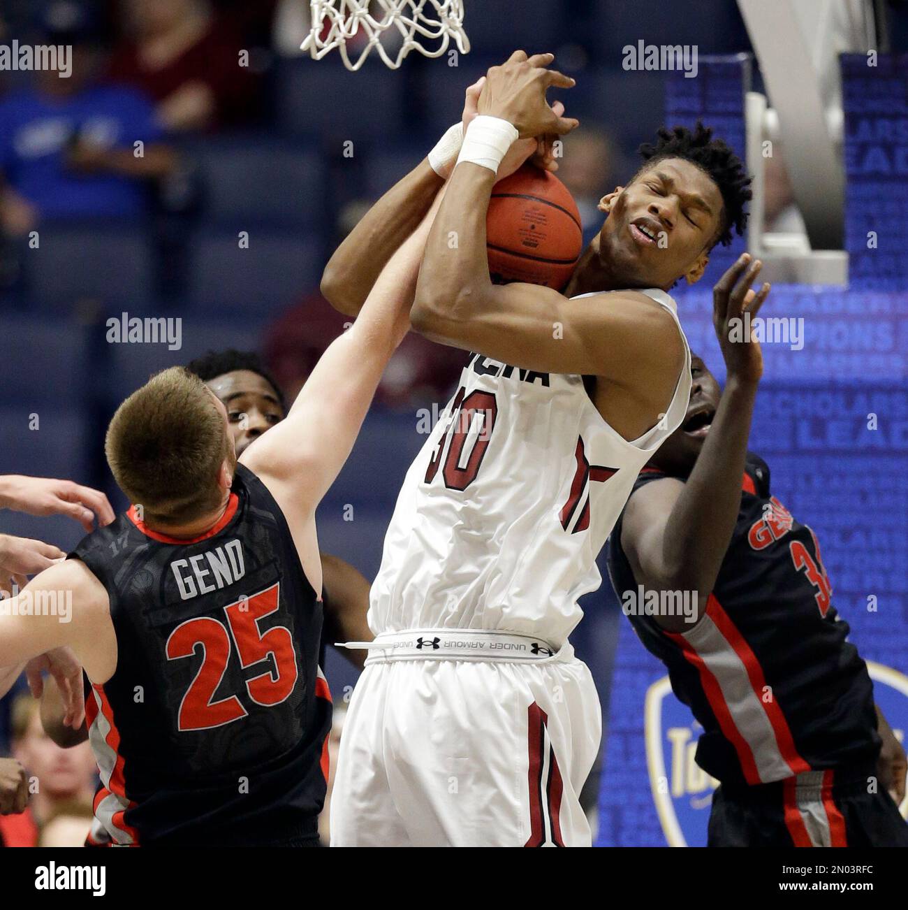 South Carolina's Chris Silva (30) and Georgia's Kenny Paul Geno (25 ...