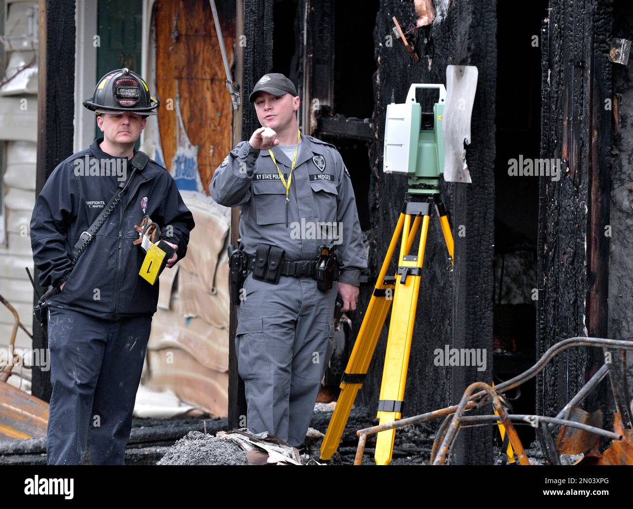 A member of the Kentucky State Police Arson Investigation Division ...