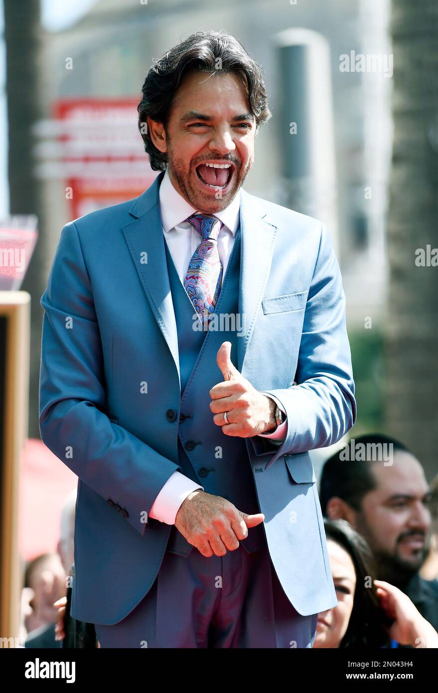Mexican actor and writer-director Eugenio Derbez gestures to fans ...