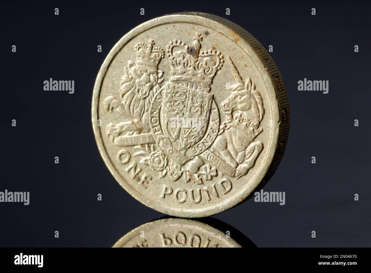 Tattered one pound coin hi-res stock photography and images - Alamy