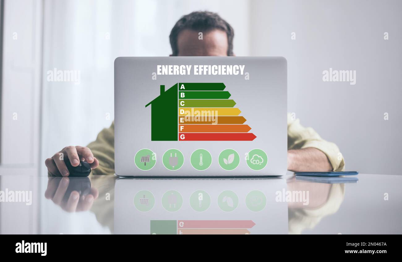 Man calculating energy buildings efficiency class. Ecological and bio ...