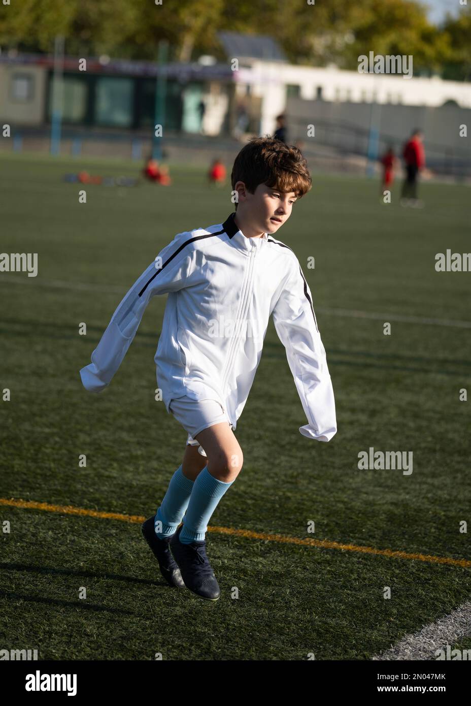 Caucasian boy exercise before game hi-res stock photography and images ...