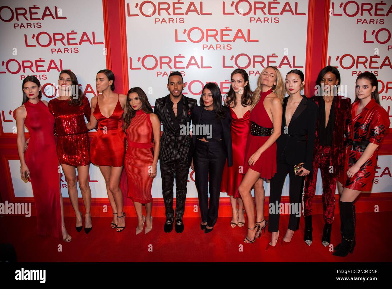 Formula One driver Lewis Hamilton, fifth left, and actresses, Eva ...
