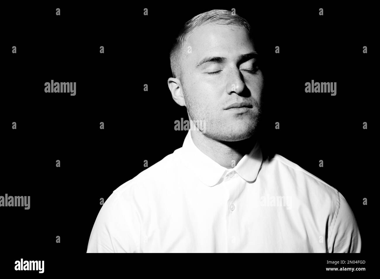 In this March 4, 2016 photo, singer-songwriter Mike Posner poses for a ...
