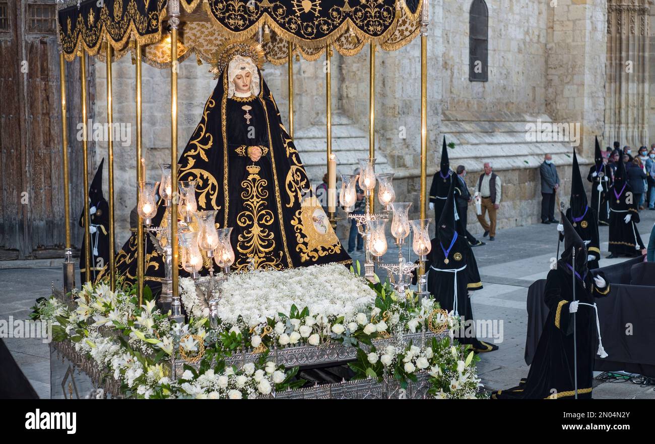 Easter Week in Palencia, Spain. Penitents carrying the image of the ...