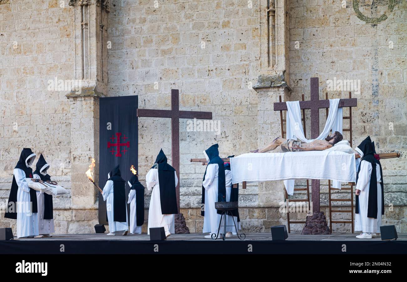 Easter Week in Palencia, Spain. Penitents and monks carrying the image ...