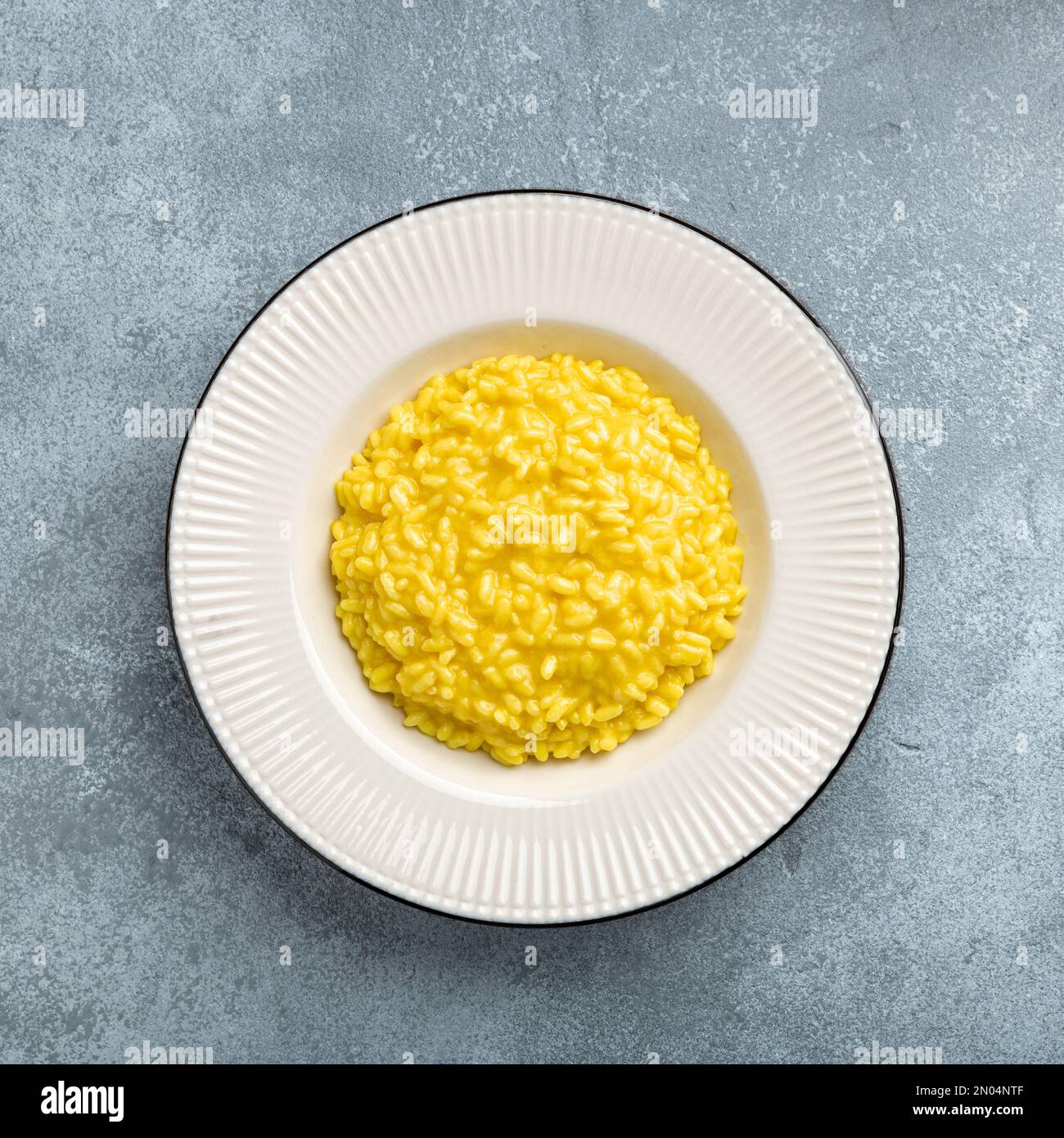 Risotto alla milanese Stock Photo - Alamy