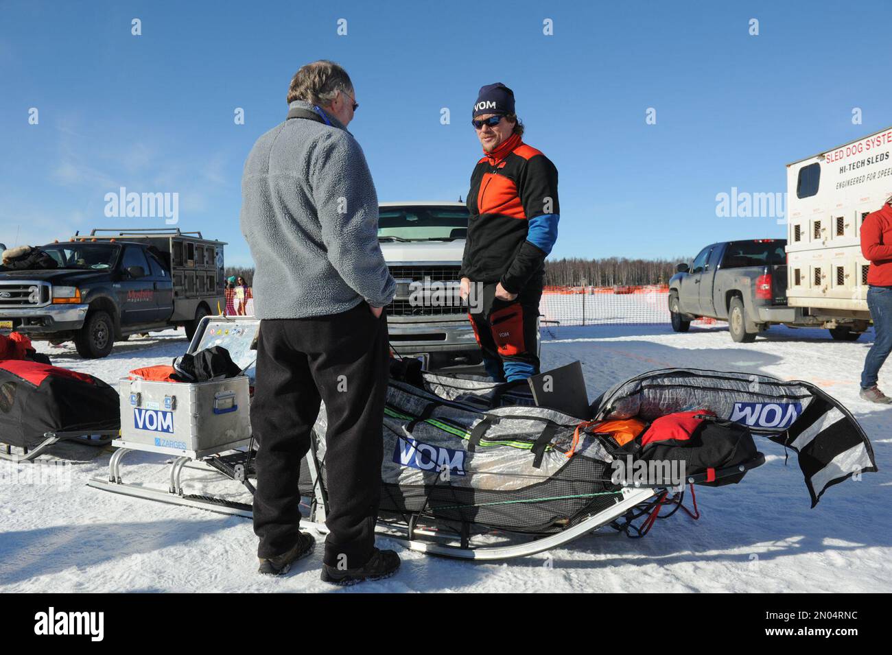 Norwegian musher Lars Monsen, right, has his sled bag checked by an ...