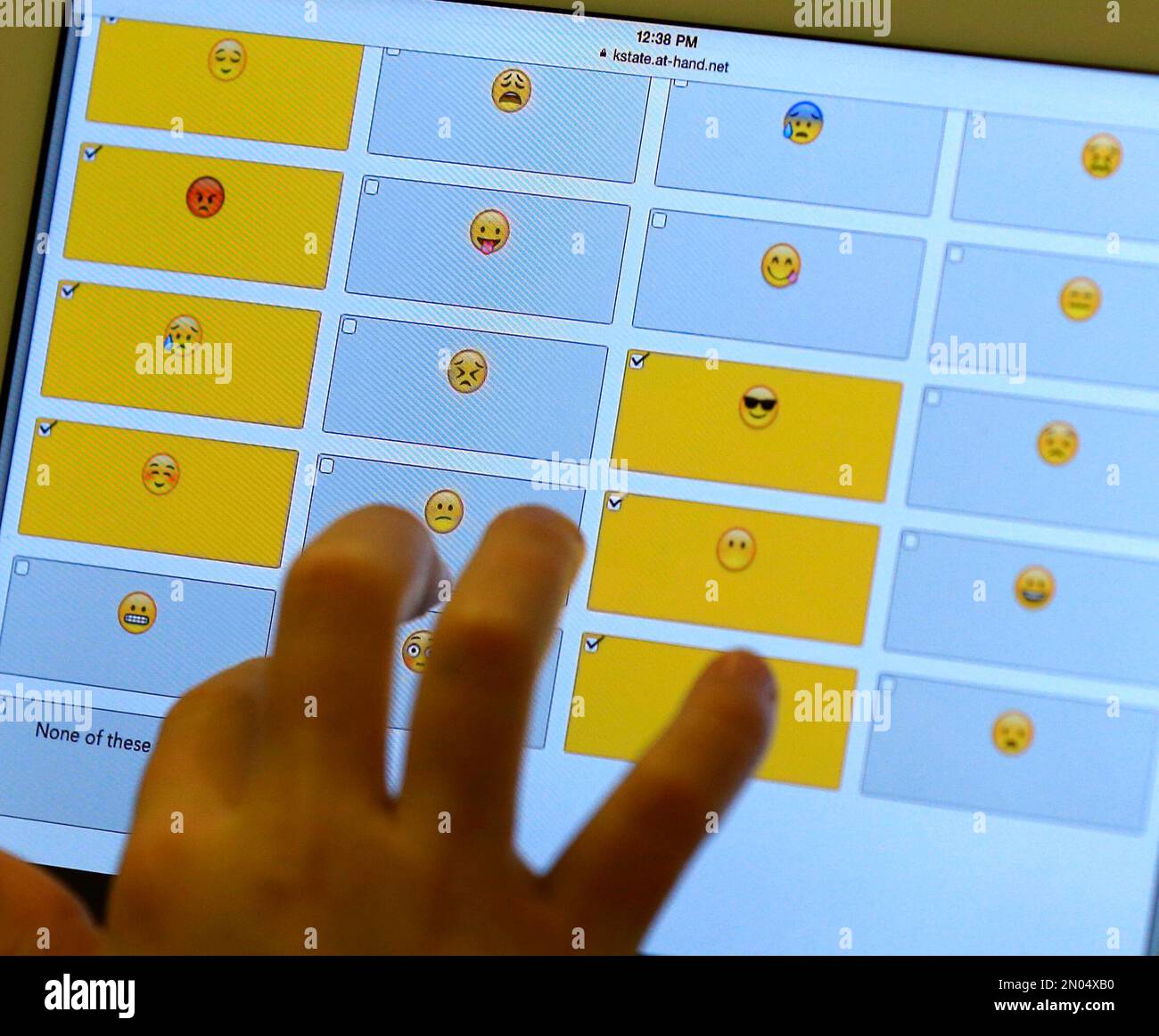 In this Feb. 15, 2016 photo, a student demonstrates how emojis are used ...
