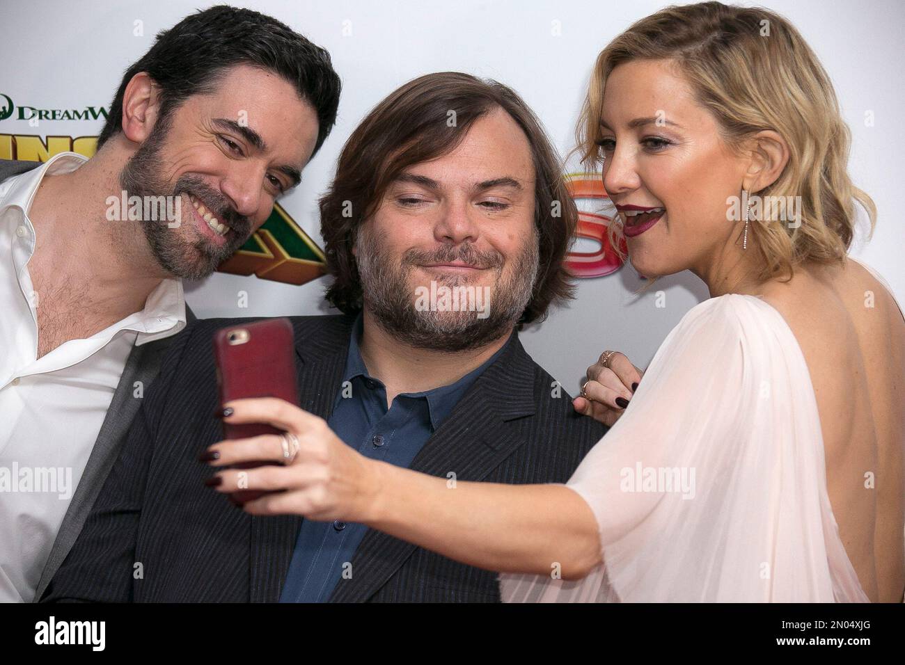 From left, Director Alessandro Carloni, Jack Black and Kate Hudson pose ...