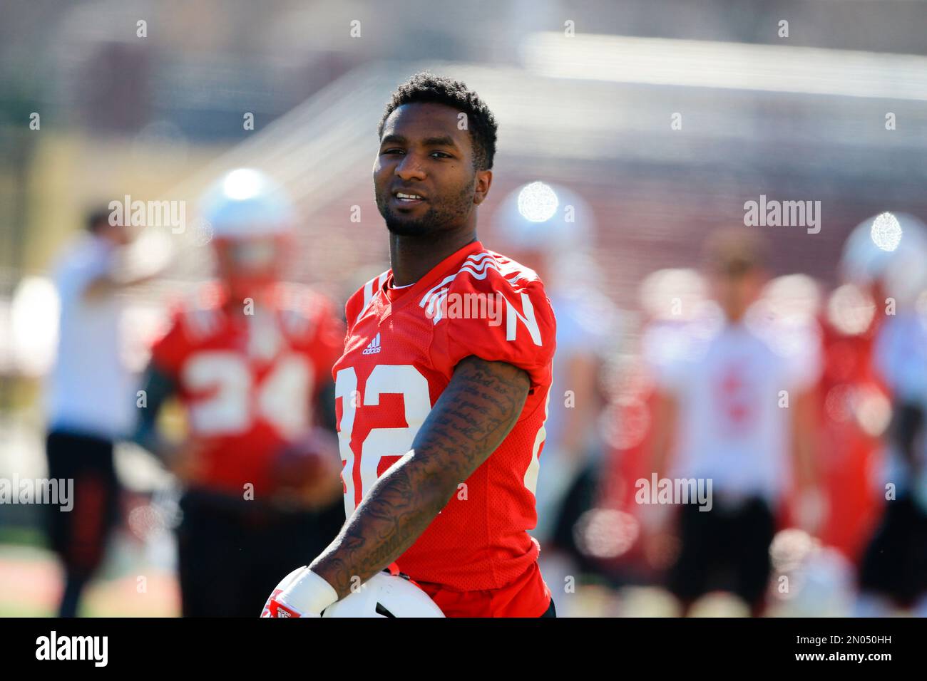 Nebraska wide receiver Alonzo Moore (82) arrives to practice on the ...