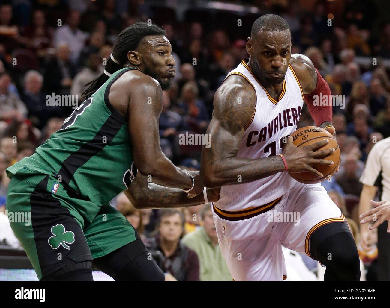 Cleveland Cavaliers' LeBron James, right, drivers past Boston Celtics ...