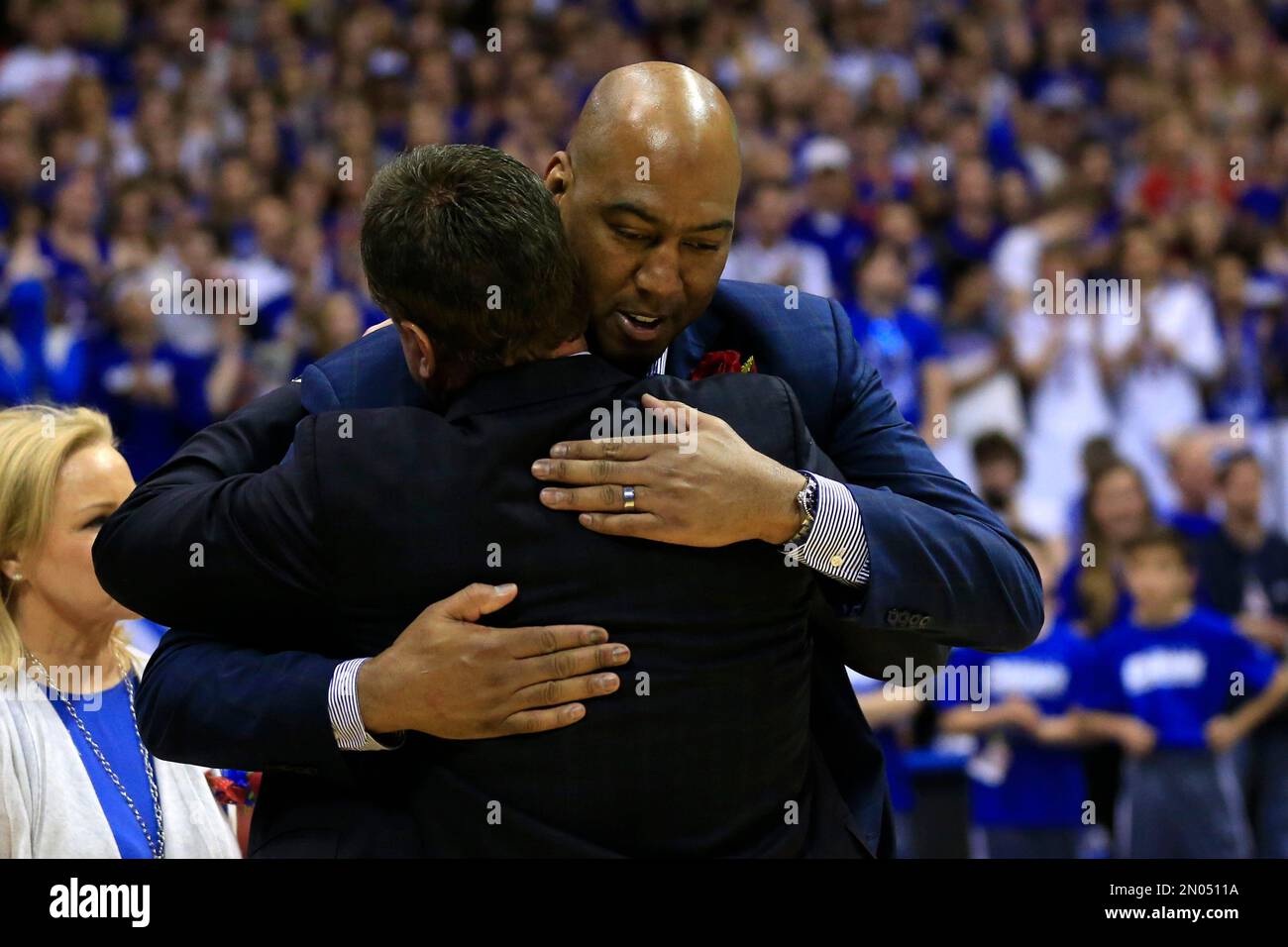 Former Kansas star Danny Manning hugs Kansas head coach Bill Self ...