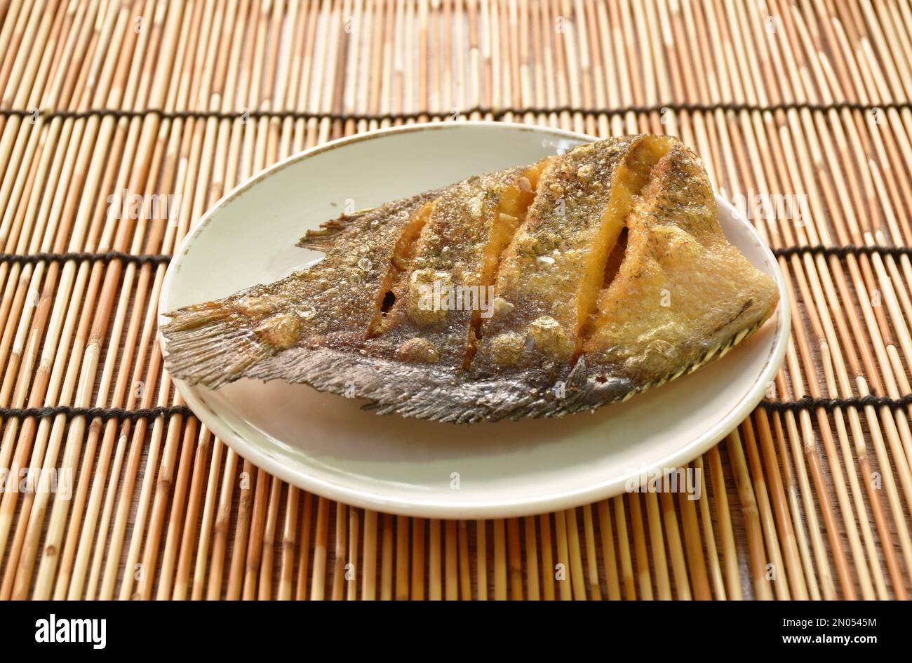 deep fried snake skin catfish or gourami on dish Stock Photo - Alamy