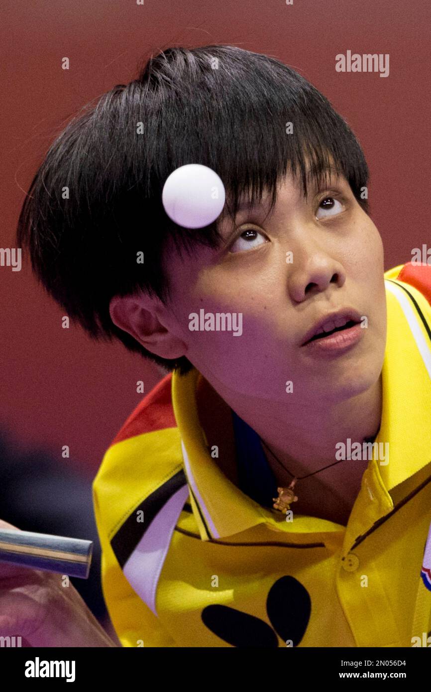 Taiwan's Cheng I-Ching eyes the ball during her semifinal match against ...
