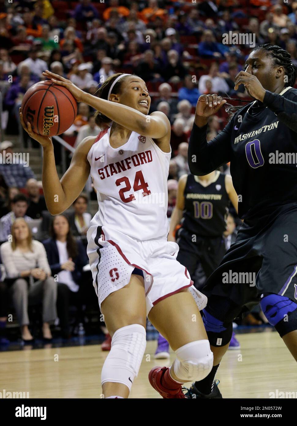 Stanford's Erica McCall (24) looks for room to pass around Washington's ...