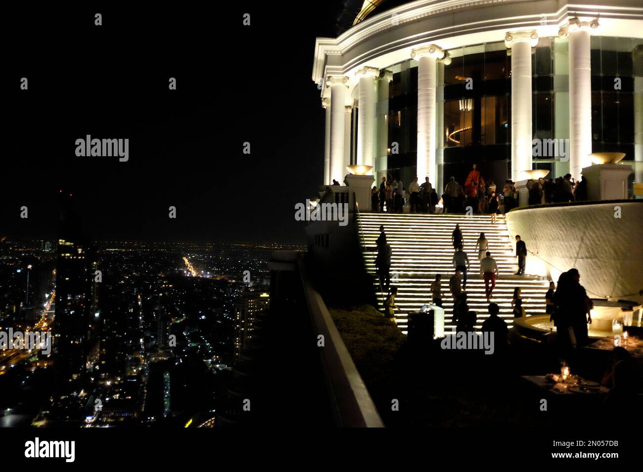 Patrons walk at the Skybar on the 64th floor at Lebua State Tower ...