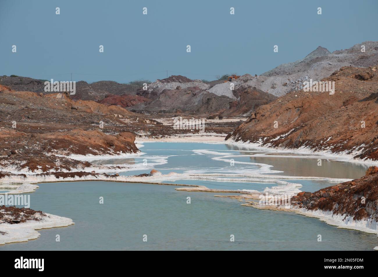 bizarre landscape with rocks and salt ponds at Hormuz island, Iran ...