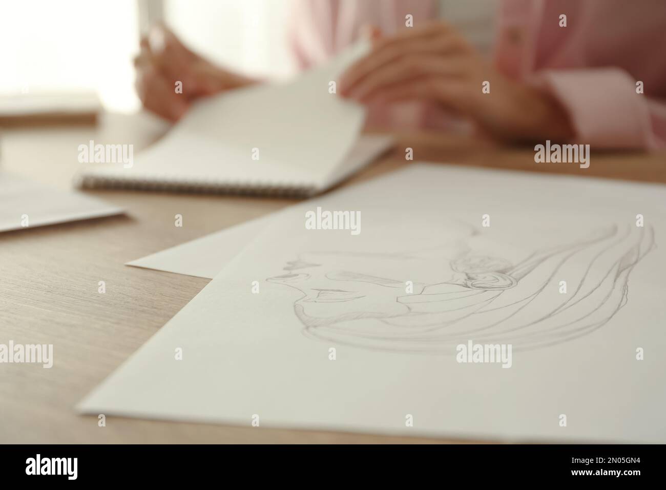 Pencil drawing of girl's portrait and blurred woman on background Stock ...