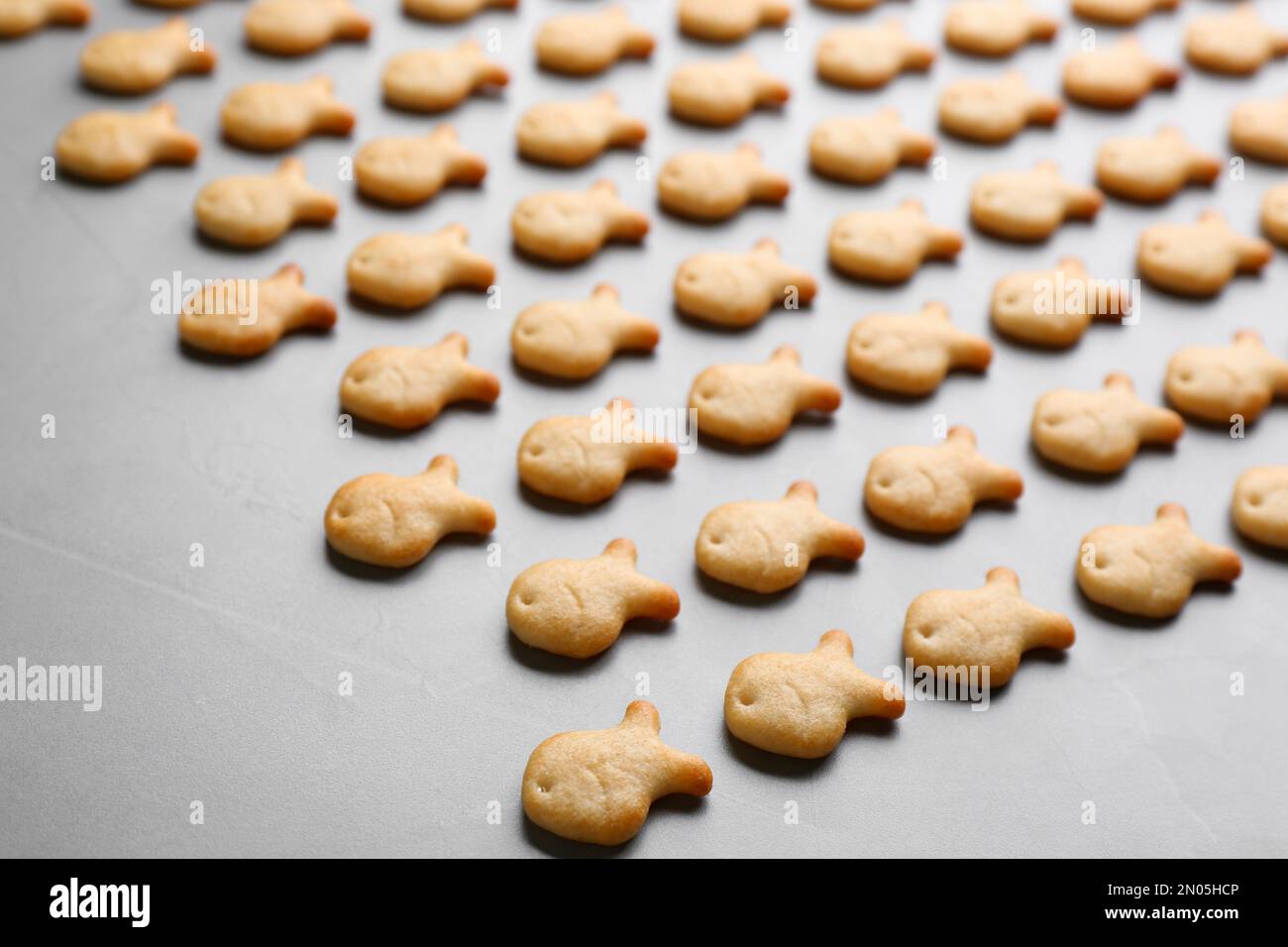 Delicious goldfish crackers on grey table, closeup Stock Photo - Alamy