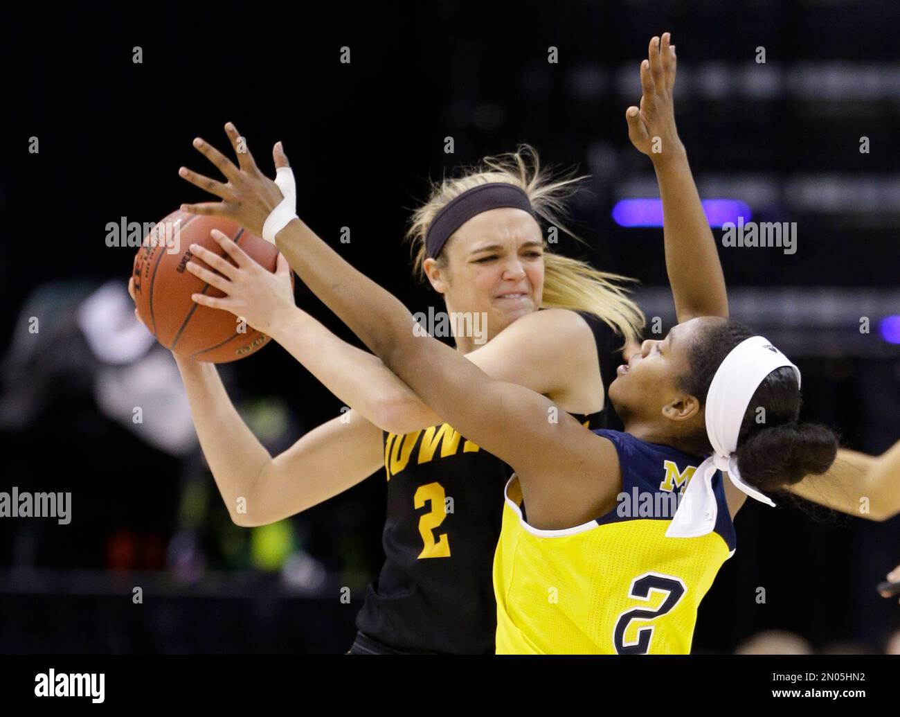 Michigan guard Siera Thompson (2), right, defends Iowa guard Ally ...