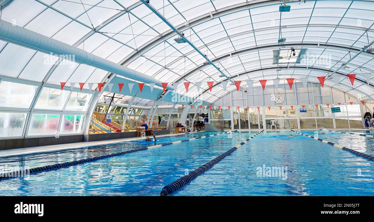 Indoor swimming pool with fiberglas covertop with swimming lanes ...