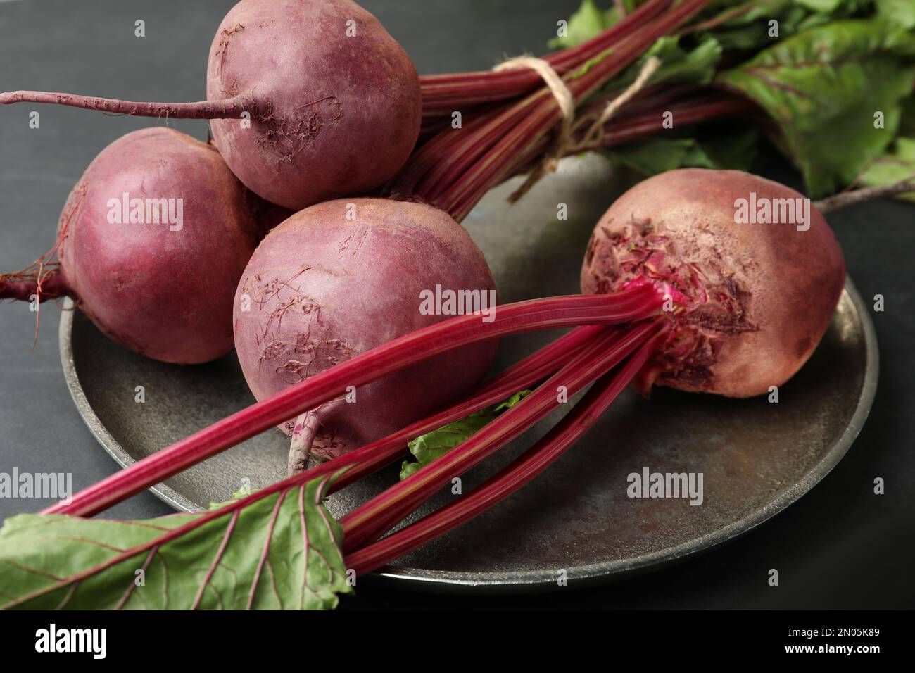 Raw ripe beets on metal platter, closeup Stock Photo - Alamy