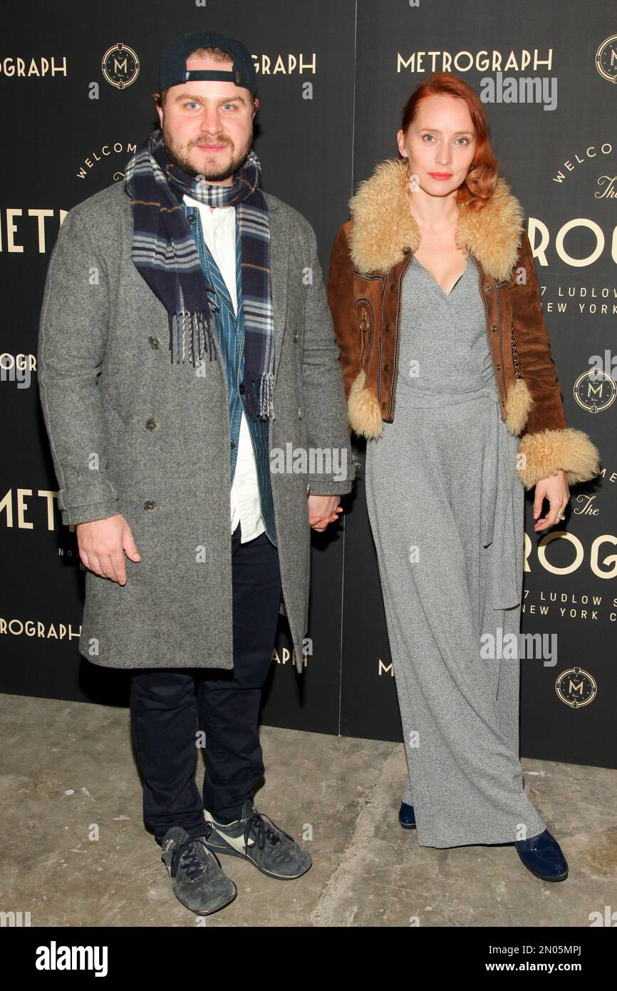 Brady Corbet, left, and Mona Fastvold, right, attend the opening night ...