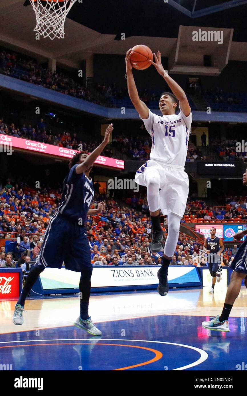 Boise State's Chandler Hutchison (15) goes up to the basket past Nevada ...