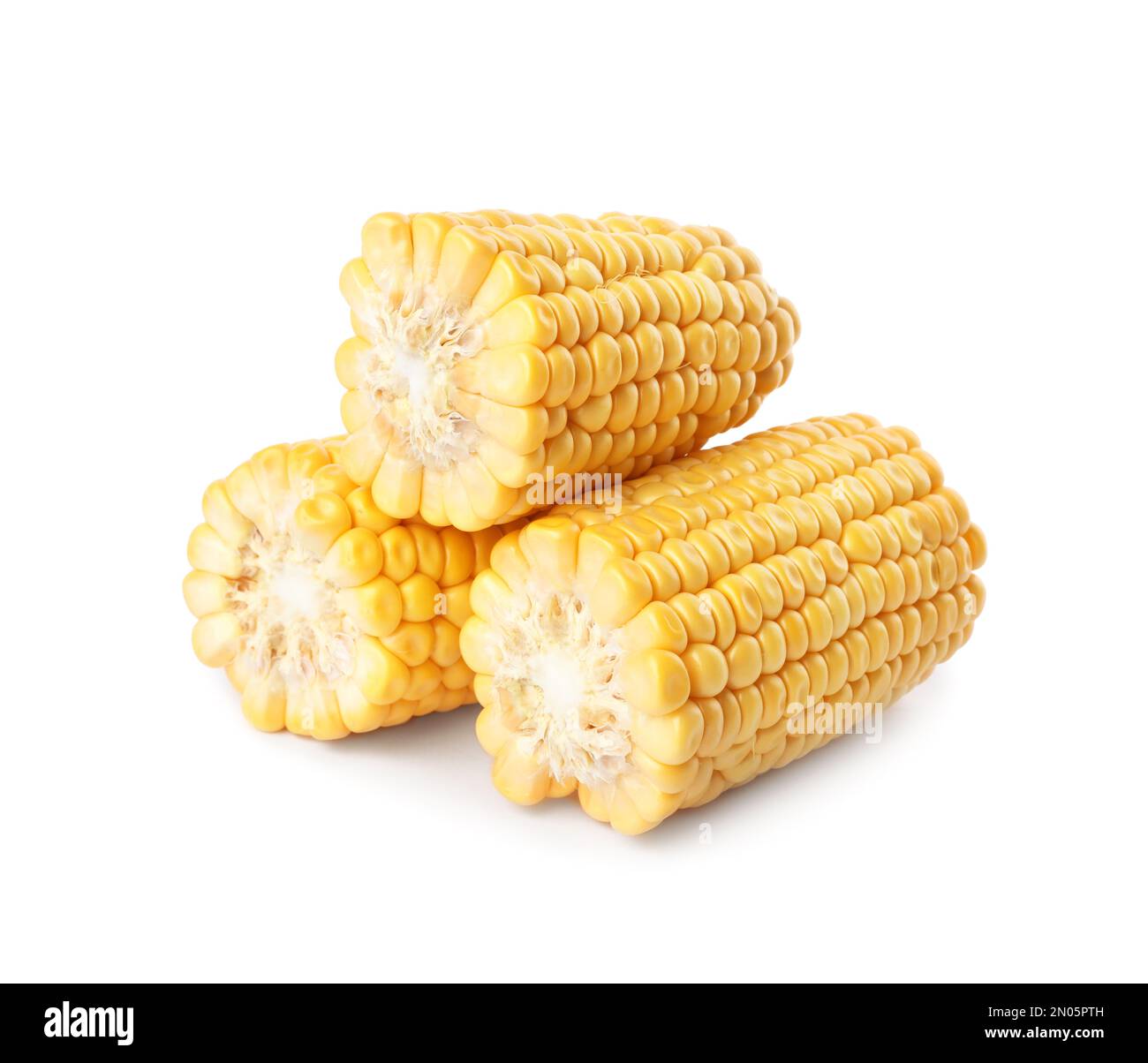 Pieces of ripe raw corn cobs on white background Stock Photo - Alamy