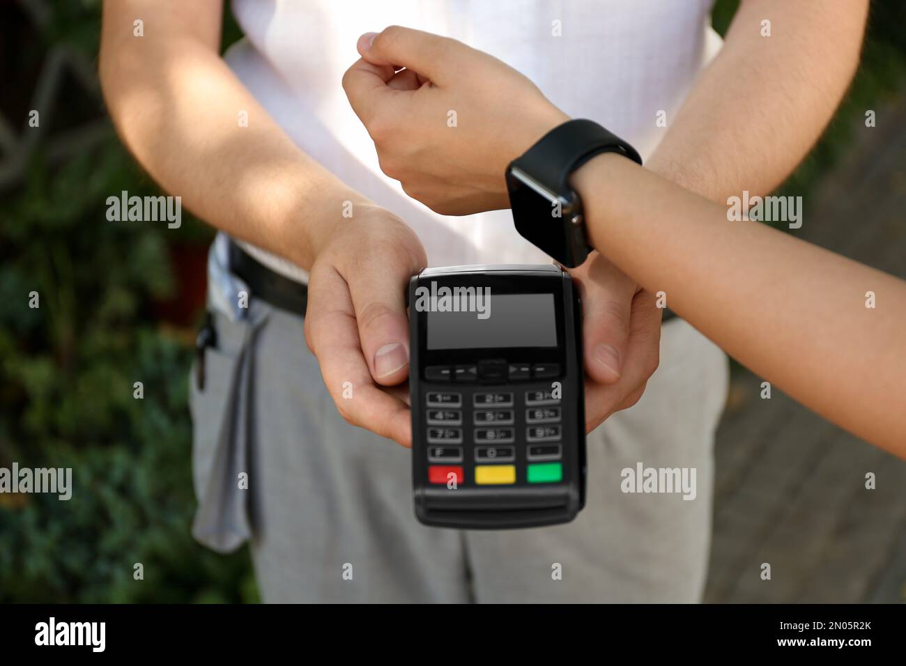 Contactless payment using smartwatch hi-res stock photography and ...