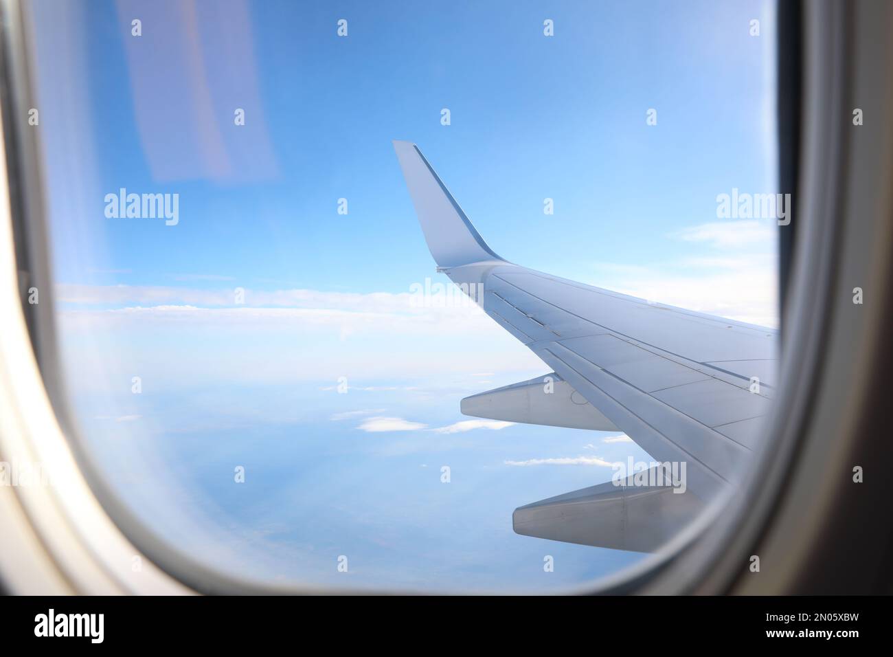 Beautiful view through plane window during flight. Air travel Stock ...