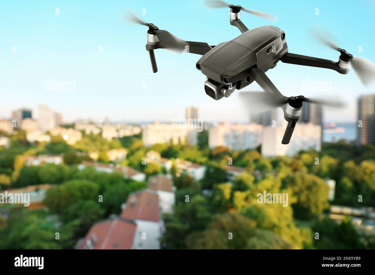 Drone flying over houses hi-res stock photography and images - Alamy