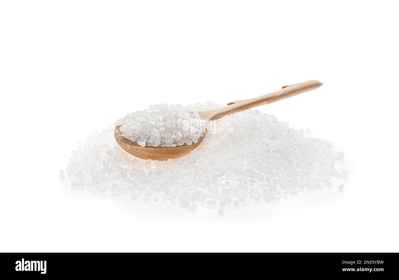 Wooden spoon with salt isolated on white Stock Photo - Alamy