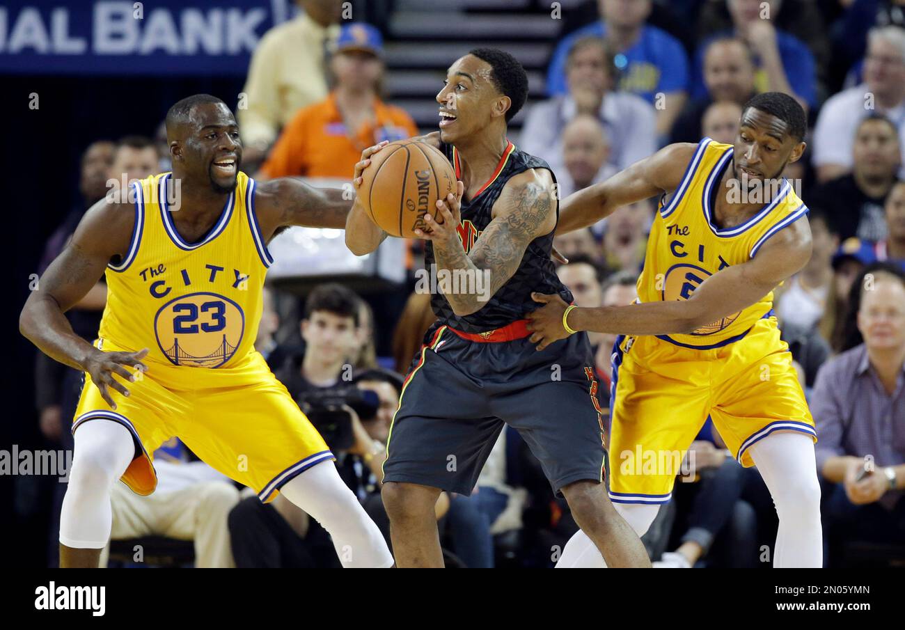 Atlanta Hawks' Jeff Teague, center, is defended by Golden State ... Atlanta Hawks' Jeff Teague, center, is defended by Golden State ...