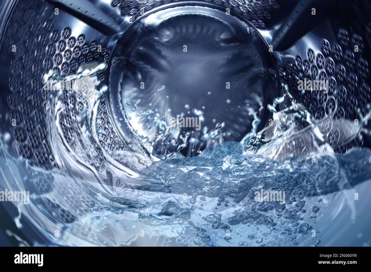 Washing machine drum with water, closeup view Stock Photo - Alamy